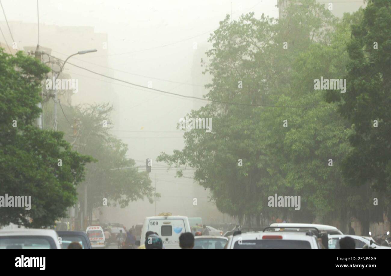 Dusty winds blowing with light raining before downpour of summer season ...