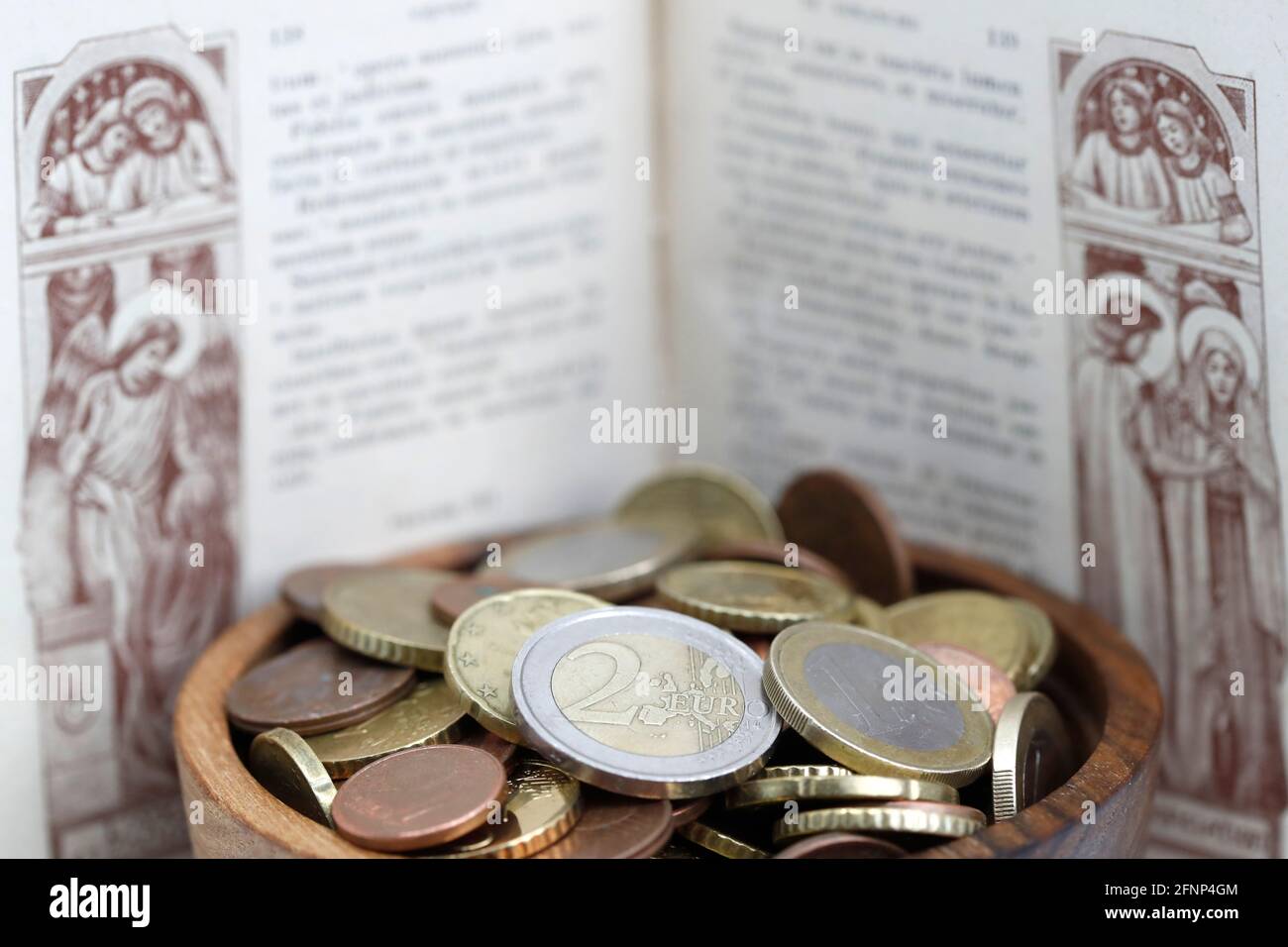 Catholic finance and economy concept with bible euro coins. France ...