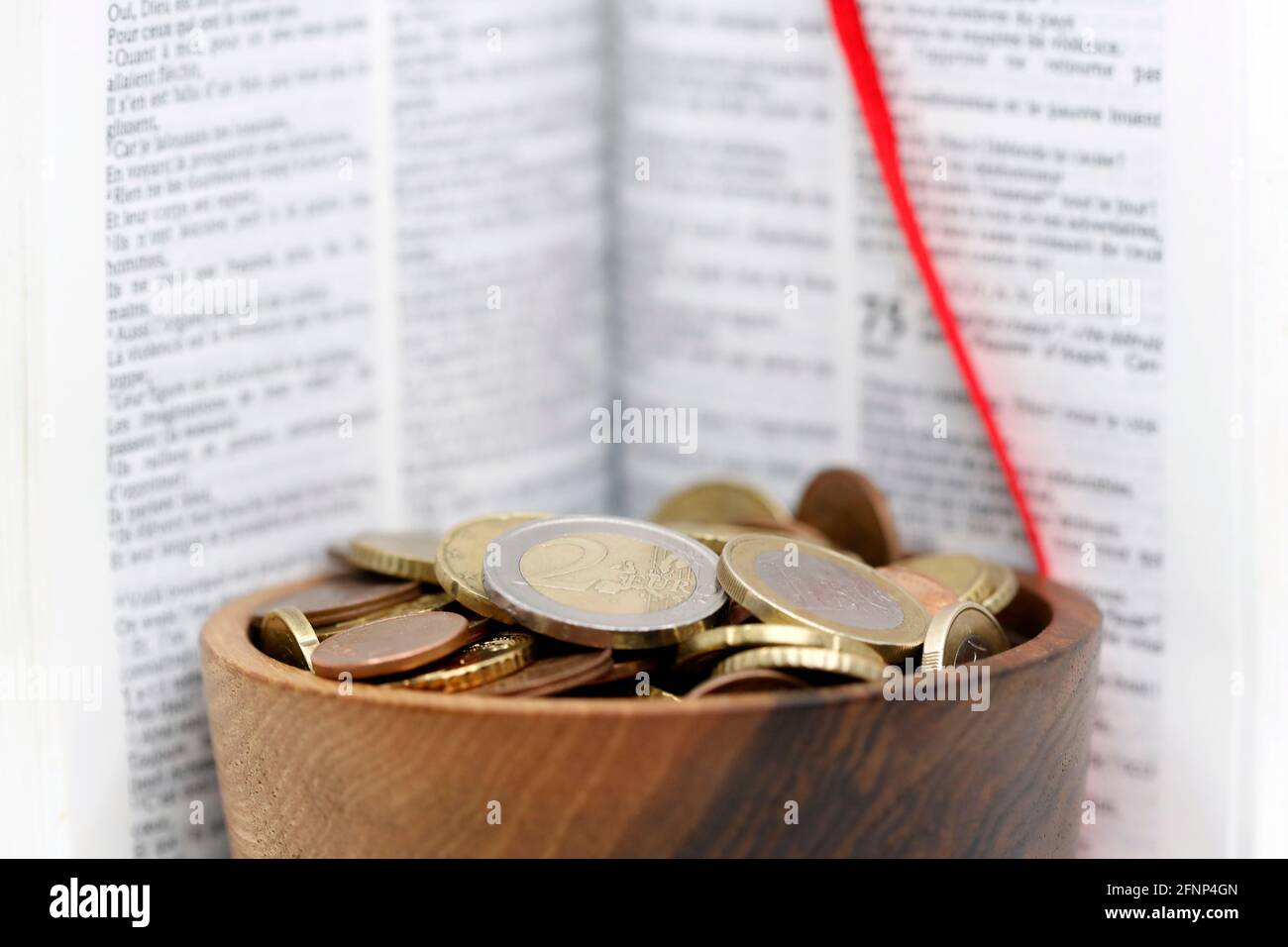 Catholic finance and economy concept with bible euro coins. France ...