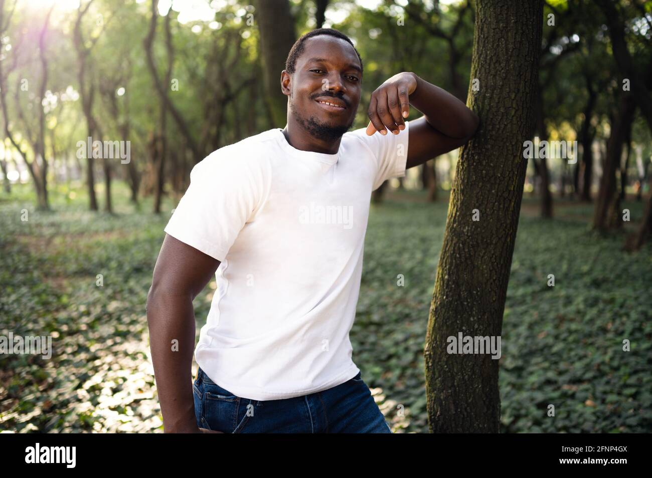 A young black man in park. Outdoor portrait of traveler. Portrait Stock ...