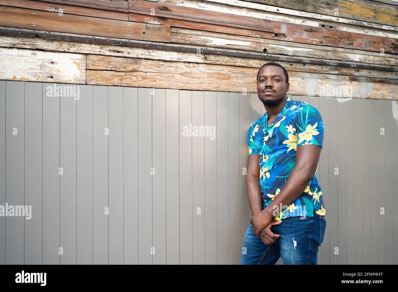 A young black man in street. Outdoor portrait of traveler. Portrait ...