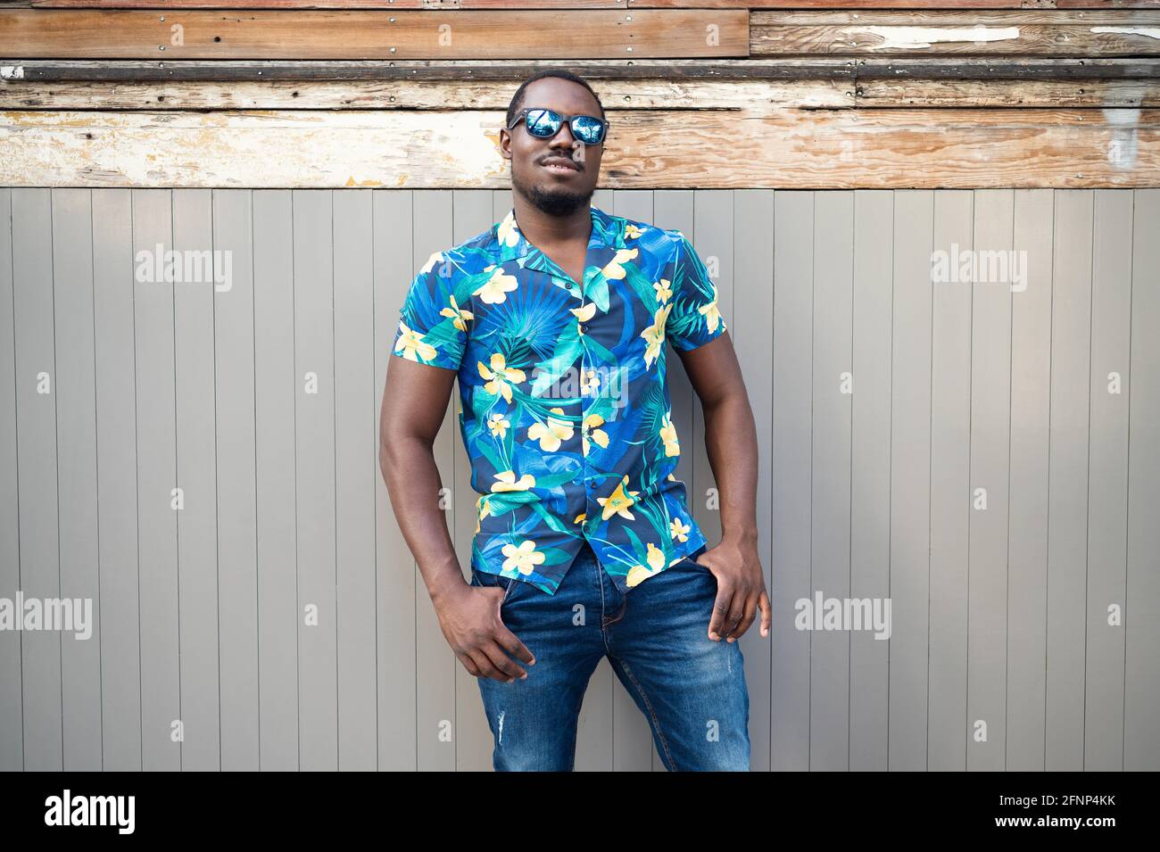 A young black man in street. Outdoor portrait of traveler. Portrait ...