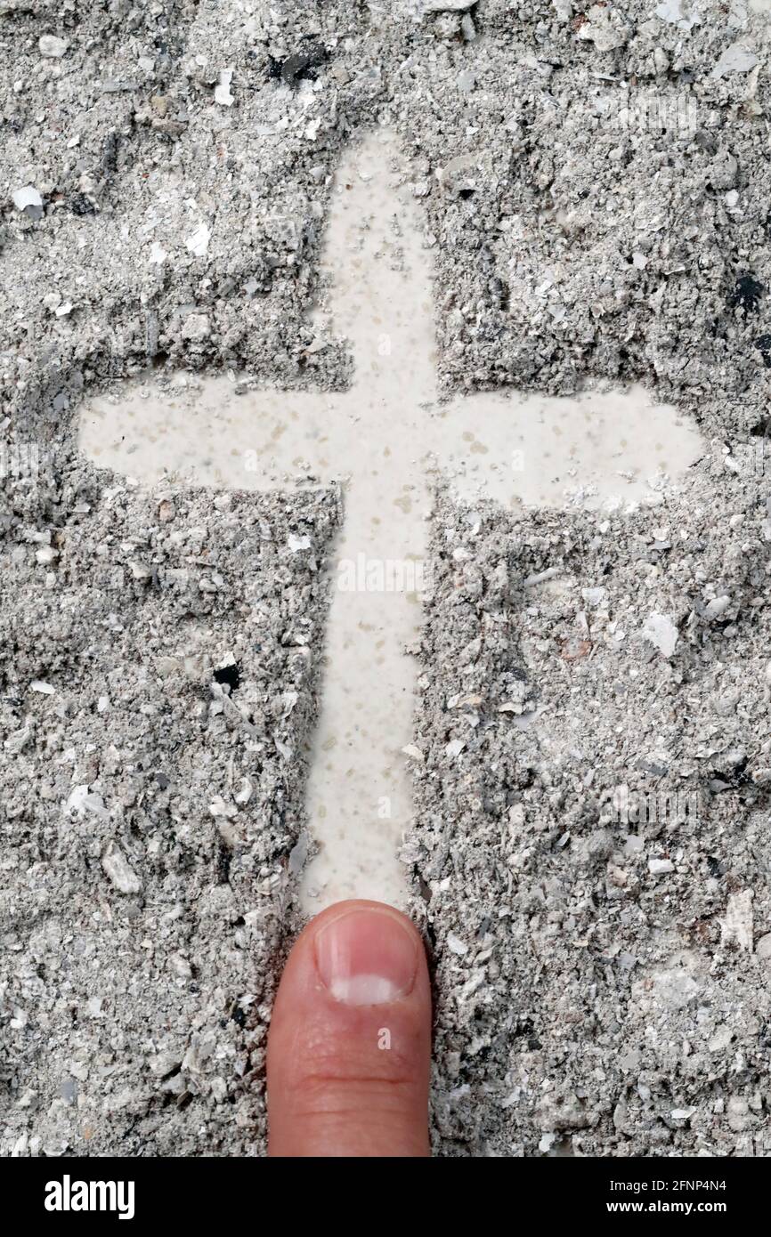 Cross made of ashes. Ash Wednesday. Lent season. France Stock Photo - Alamy