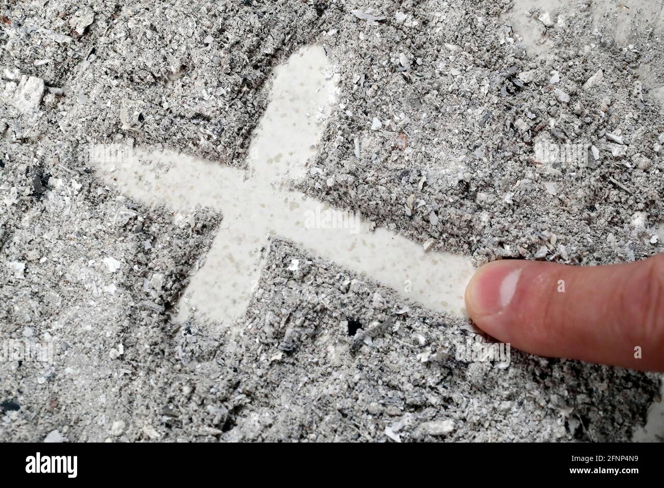 Cross made of ashes. Ash Wednesday. Lent season. France Stock Photo - Alamy