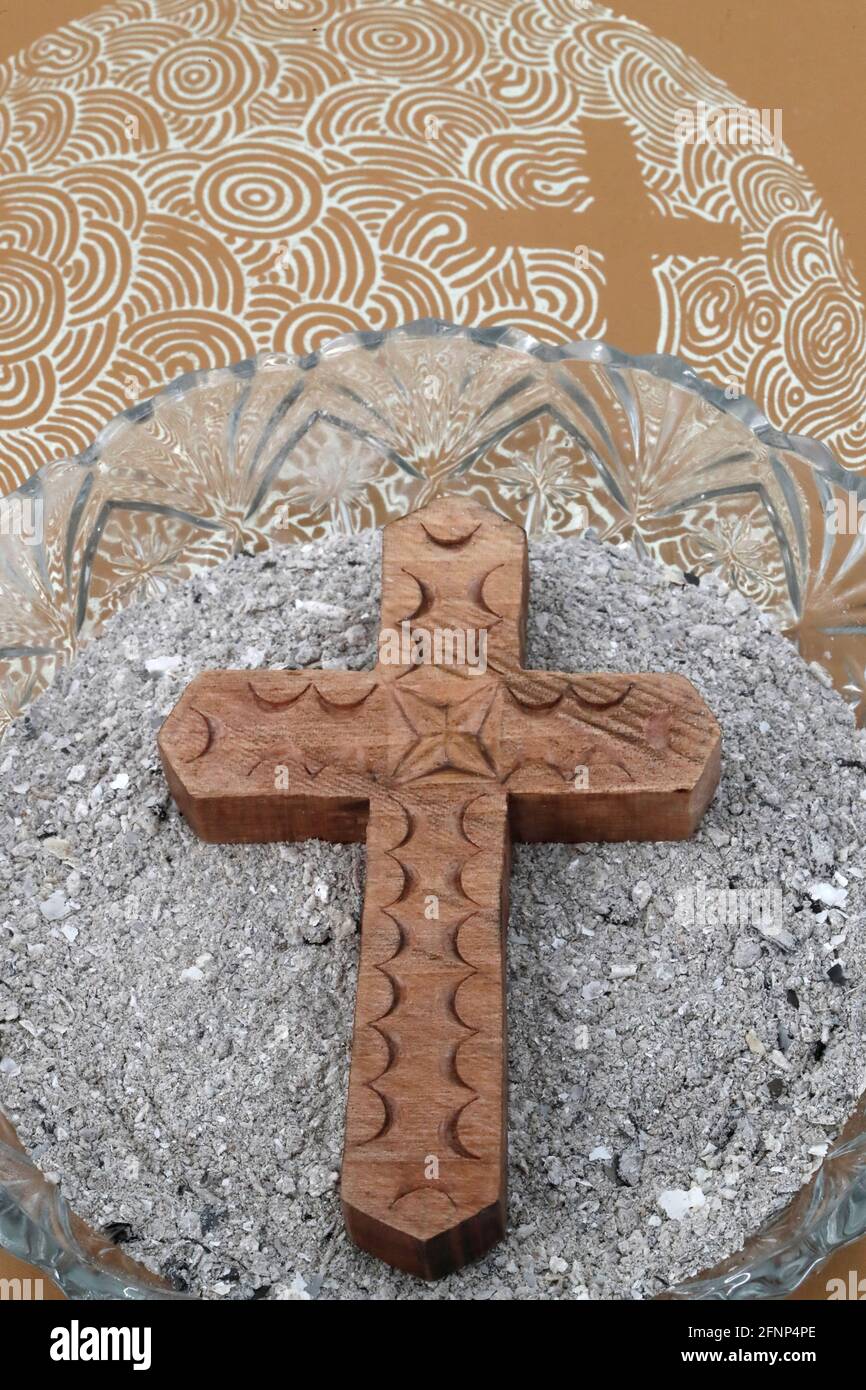 Ashes, cross and bible. Ash Wednesday. Lent season. Catholic church ...
