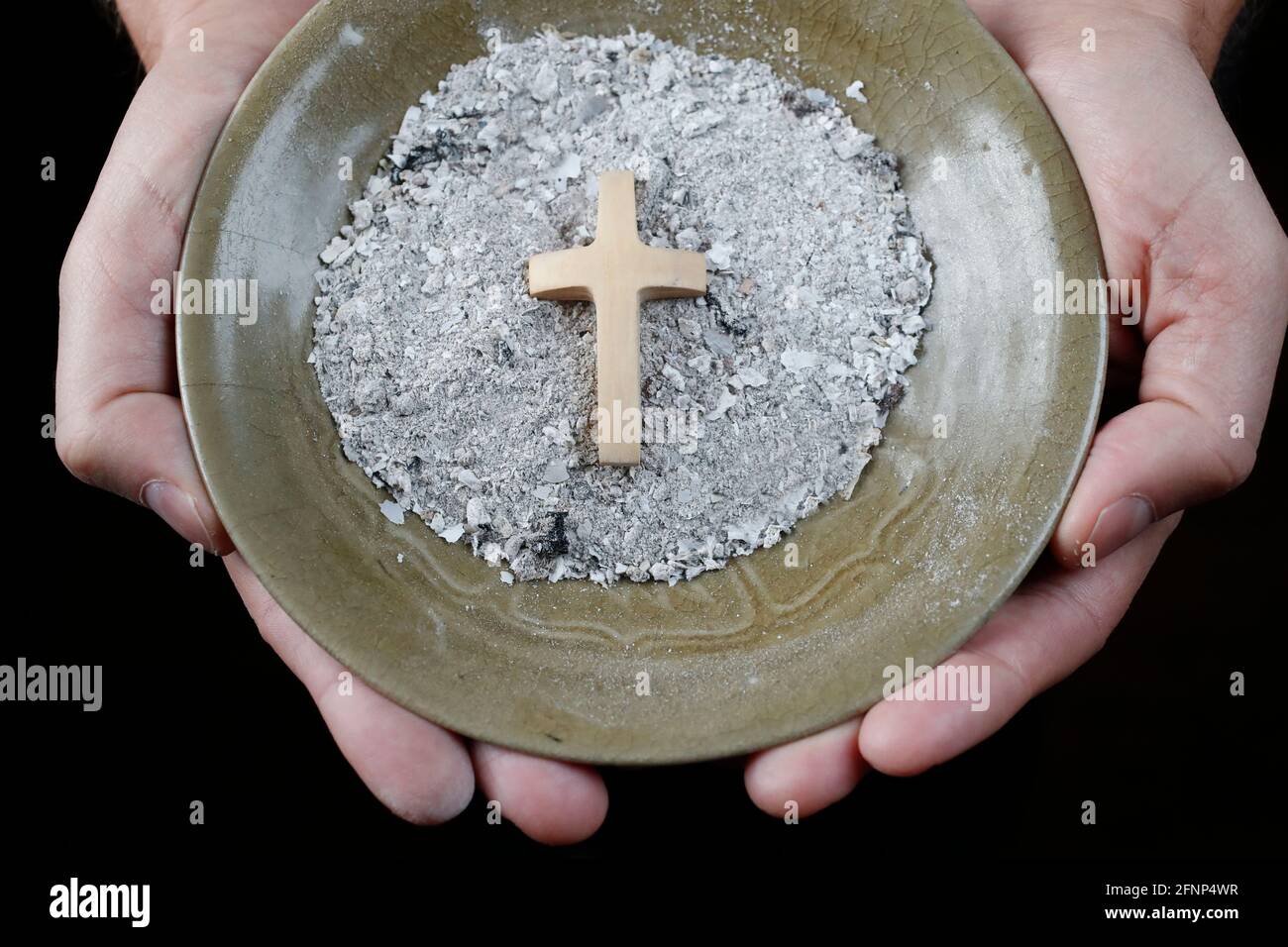 Close-up on hands and ashes. Ash Wednesday celebration. Lent season ...