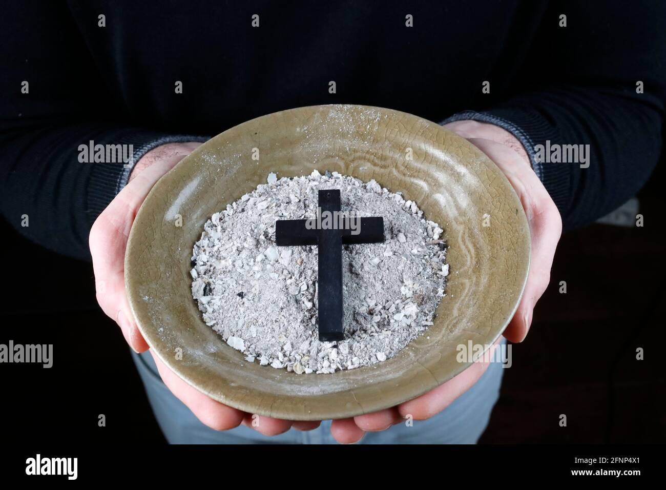 Close-up on hands and ashes. Ash Wednesday celebration. Lent season ...