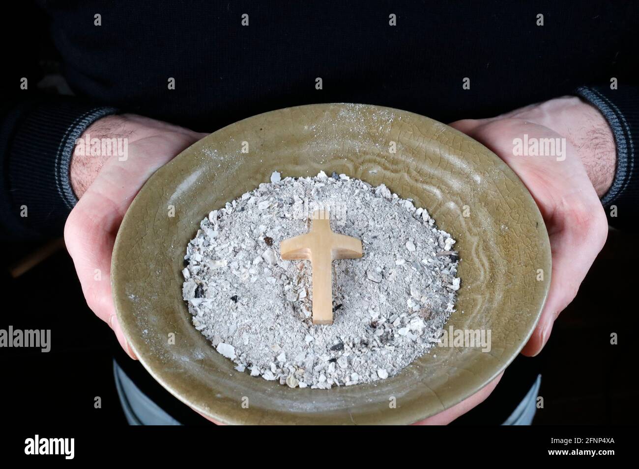 Close-up on hands and ashes. Ash Wednesday celebration. Lent season ...