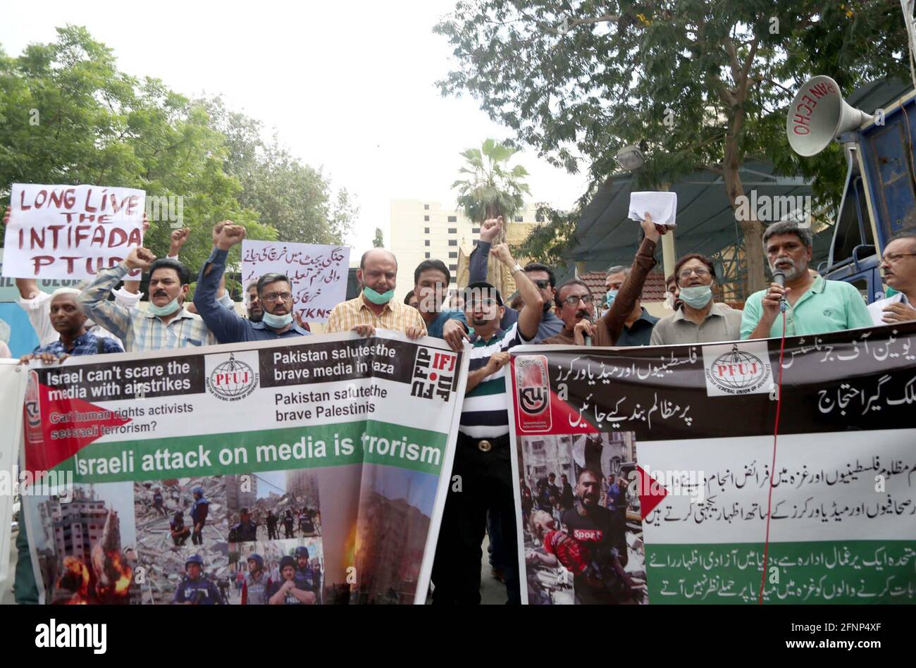 Members of Pakistan Federal Union of Journalists (PFUJ) are holding ...