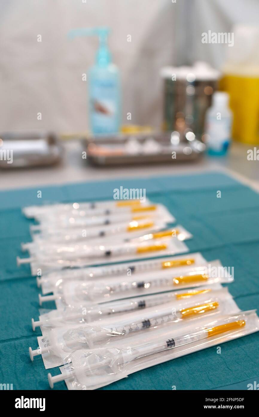 COVID-19 vaccination center. Syringes with corona serum. Moderna COVID ...