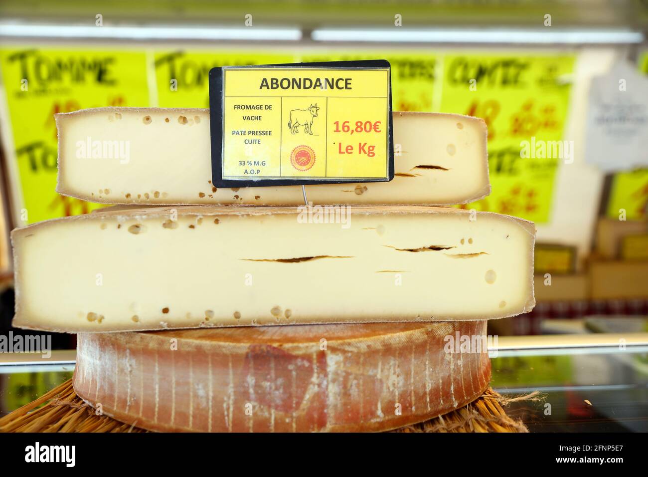 Traditional french cheese for sale at market. Abondance. Saint-Gervais ...