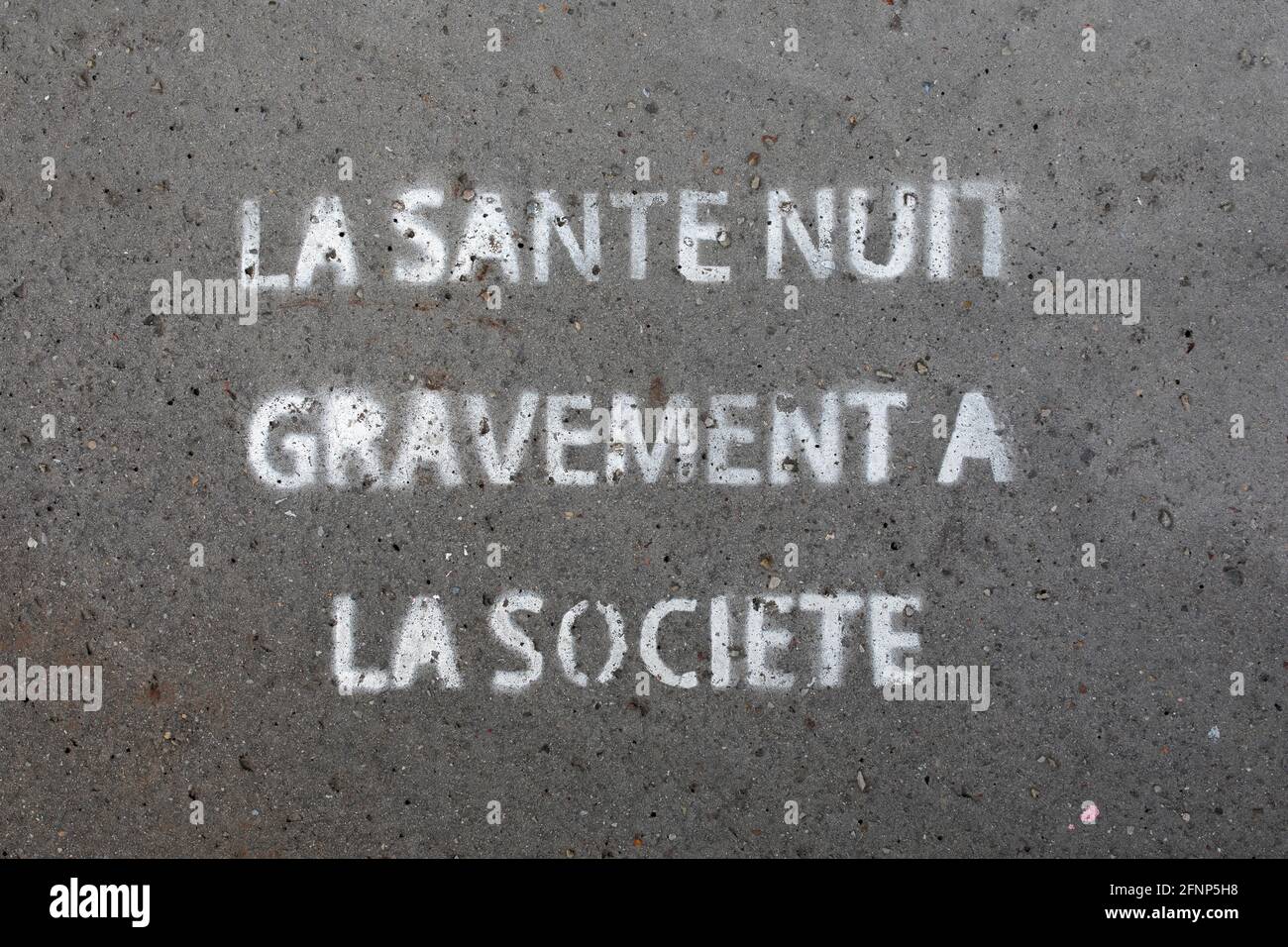 Slogan on a Paris sidewalk, France Stock Photo - Alamy