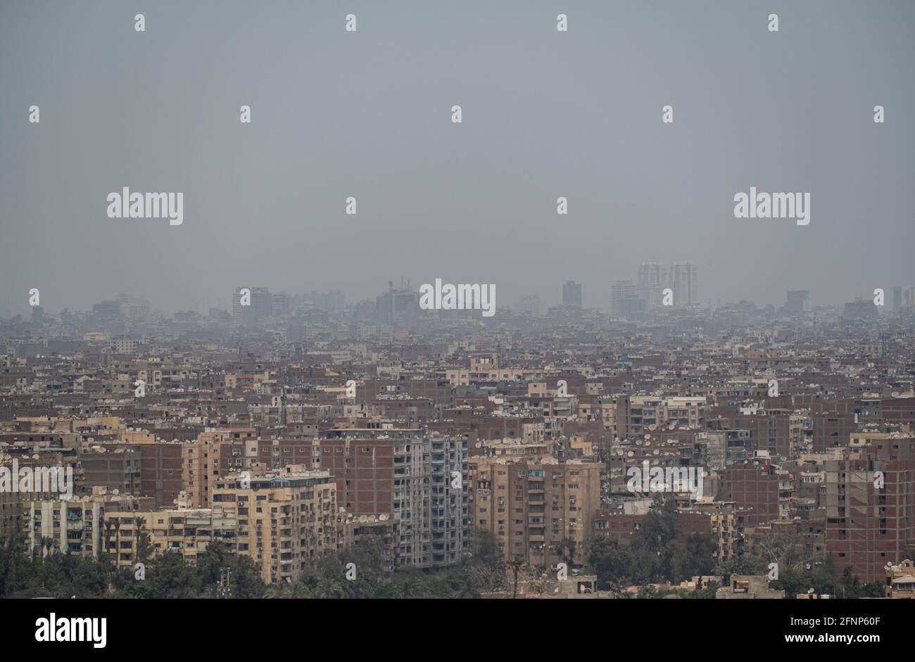 View on the city of Giza in a morning with smog, outskirts of Cairo, as ...