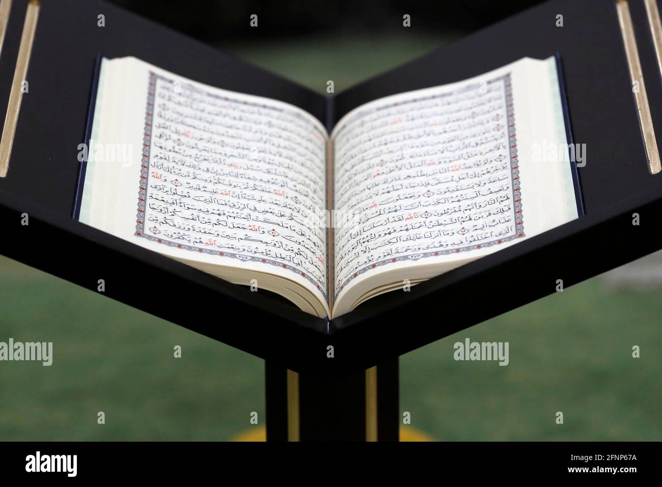 Islamic holy book Quran in mosque opened for reading and prayer. Dubai ...