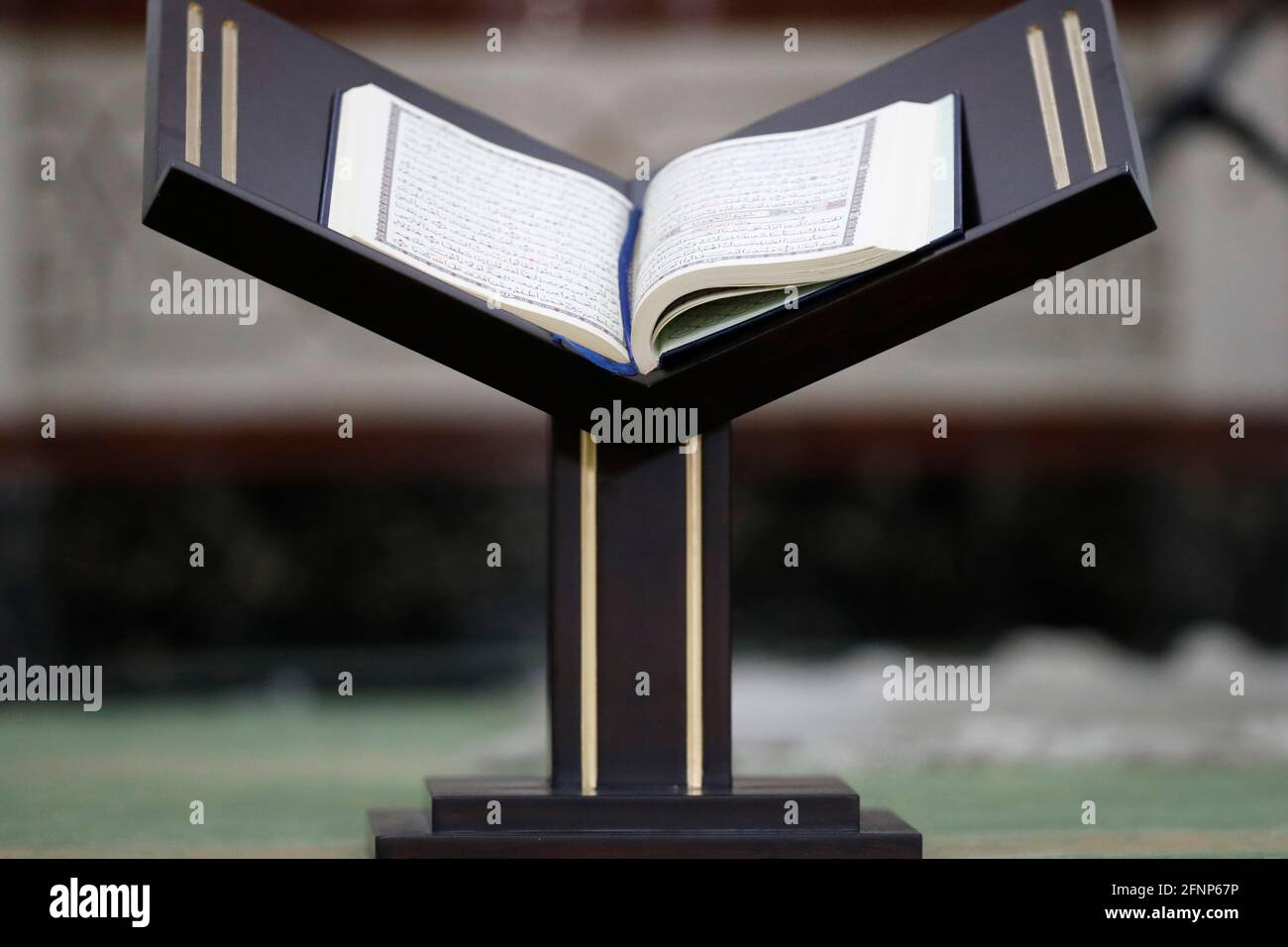 Islamic holy book Quran in mosque opened for reading and prayer. Dubai ...