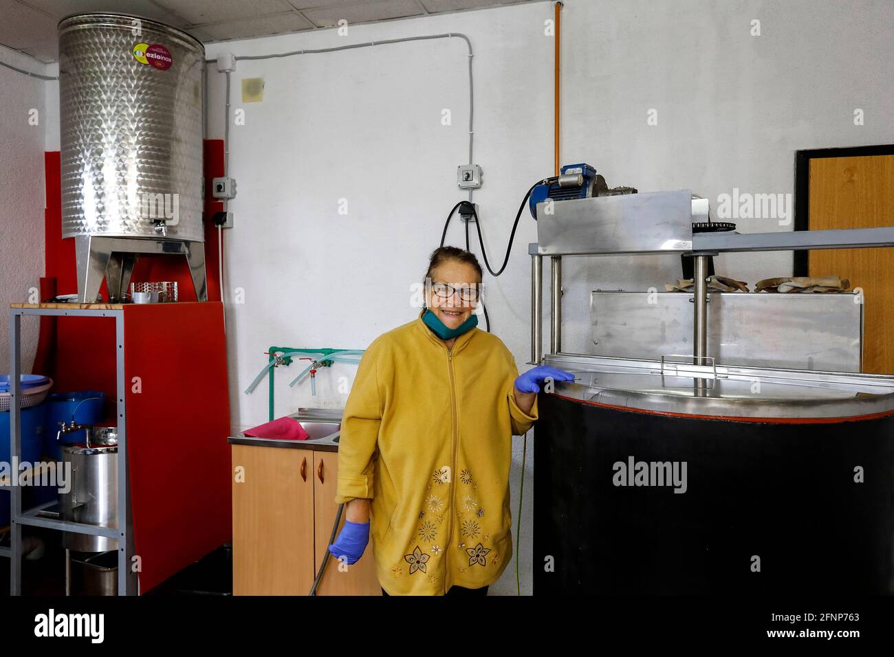 Food producer in her workshop in Barek, a suburb of Sarajevo, Bosnia ...