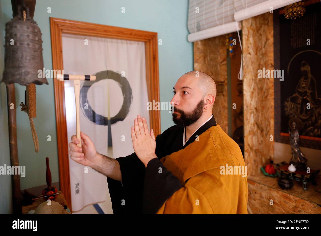 Zen buddhist master calling disciples to zazen in his dojo in Marrubiu ...