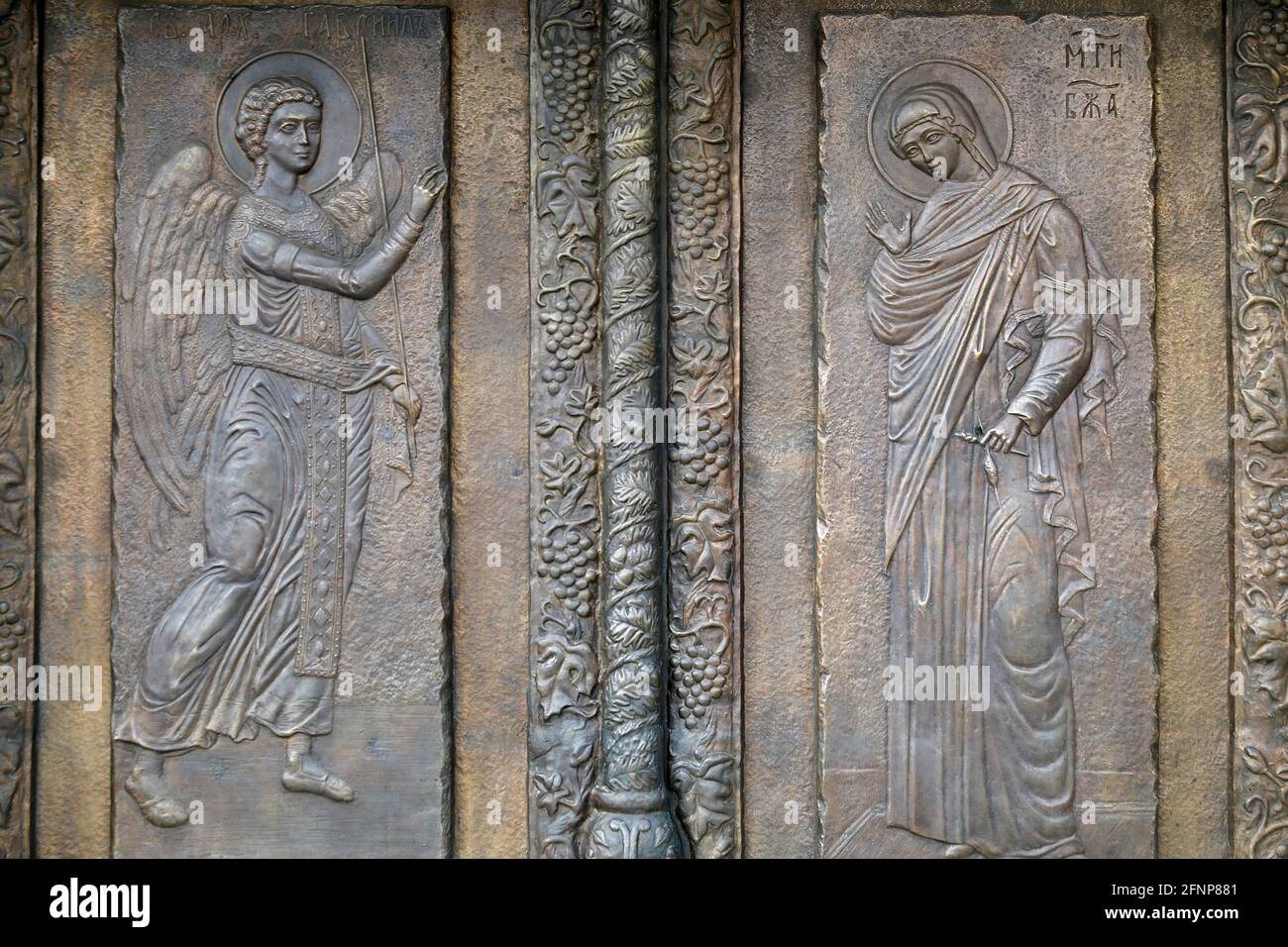 Resurrection orthodox cathedral, Podgorica, Montenegro. Reliefs on door ...