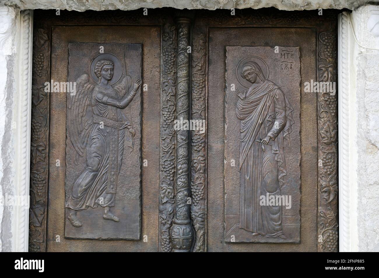 Resurrection orthodox cathedral, Podgorica, Montenegro. Reliefs on door ...