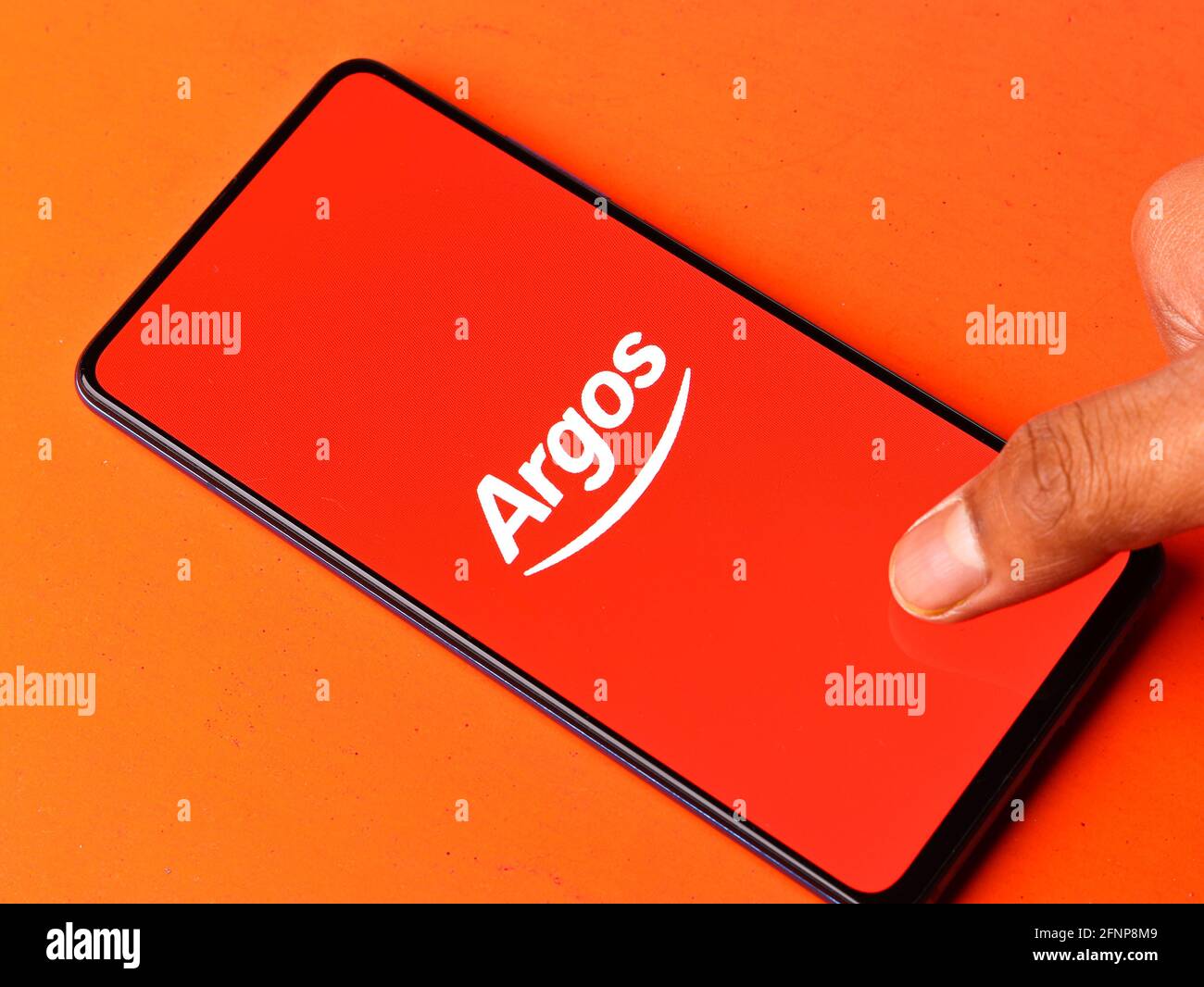 Assam, india - May 18, 2021 : Argos logo on phone screen stock image ...