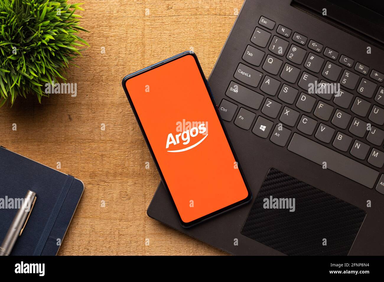 Assam, india - May 18, 2021 : Argos logo on phone screen stock image ...