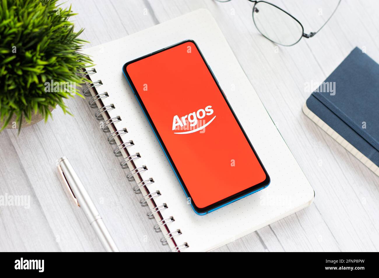 Assam, india - May 18, 2021 : Argos logo on phone screen stock image ...