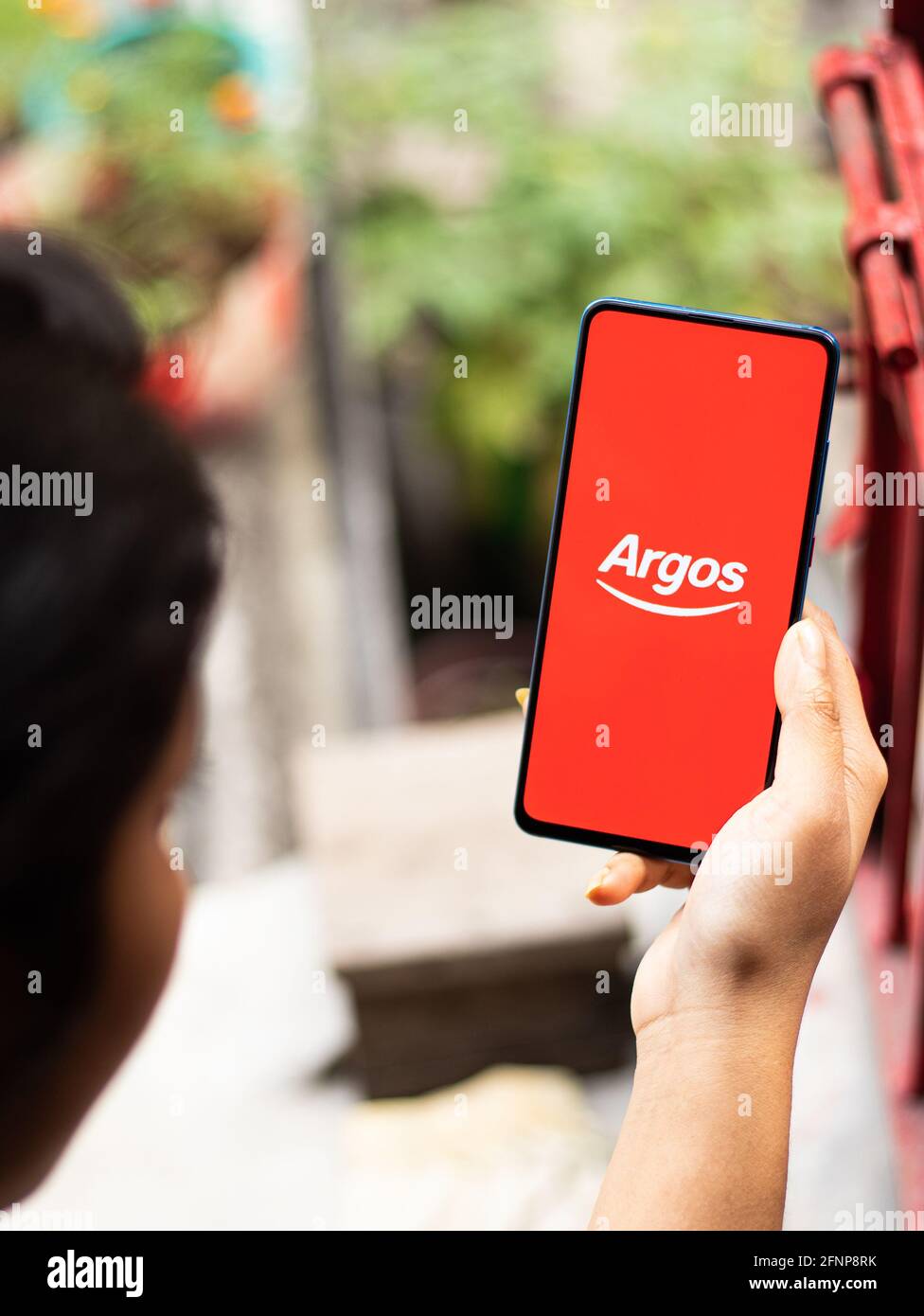 Assam, india - May 18, 2021 : Argos logo on phone screen stock image ...