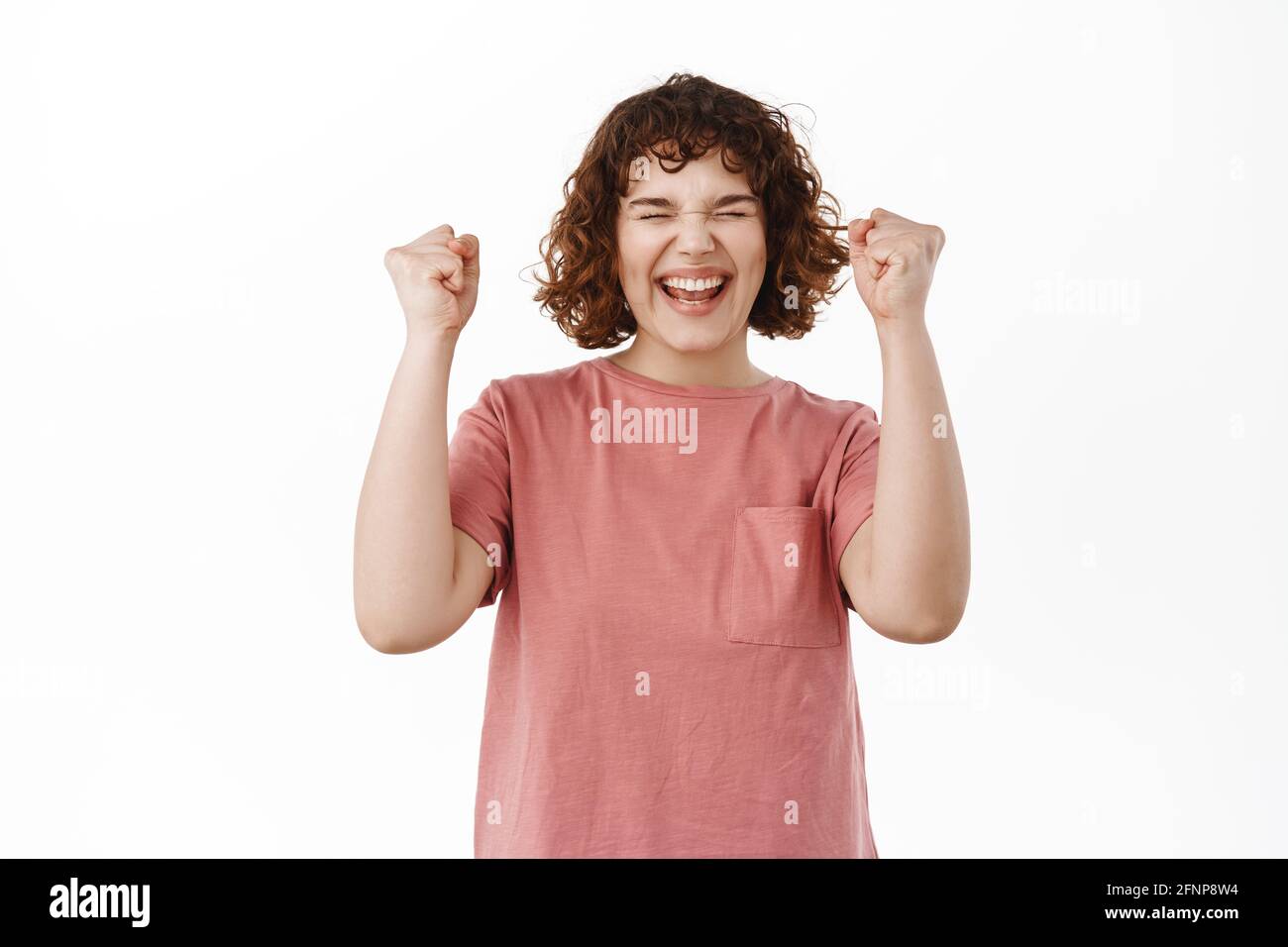 Girl cheering win hi-res stock photography and images - Alamy