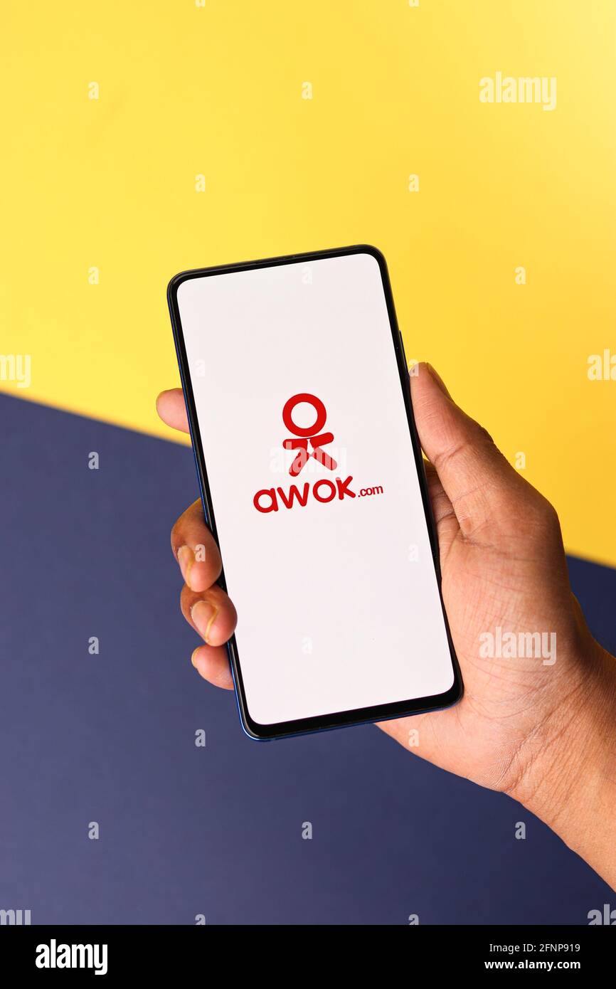 Assam, india - May 18, 2021 : Awok logo on phone screen stock image ...