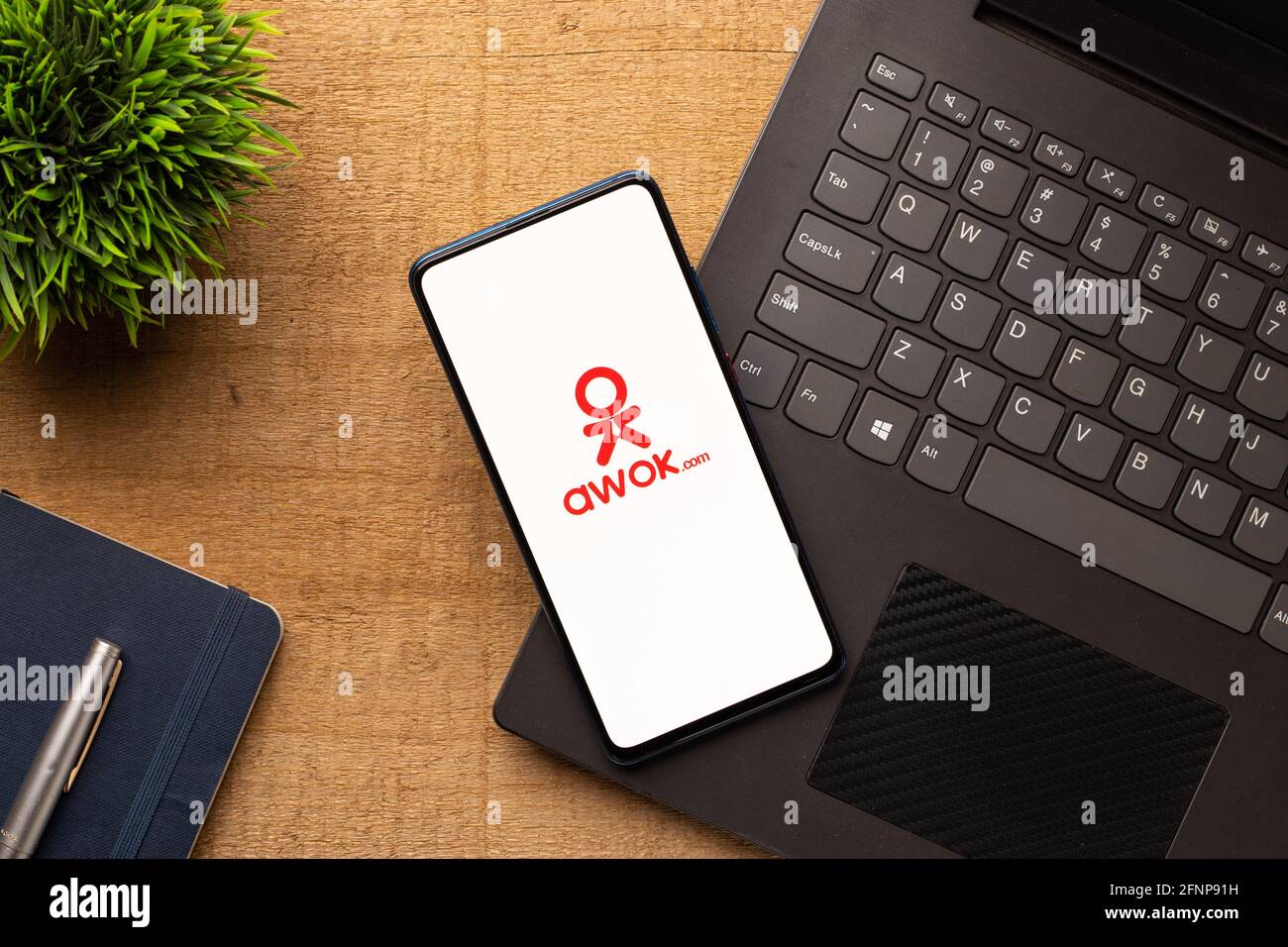 Assam, india - May 18, 2021 : Awok logo on phone screen stock image ...