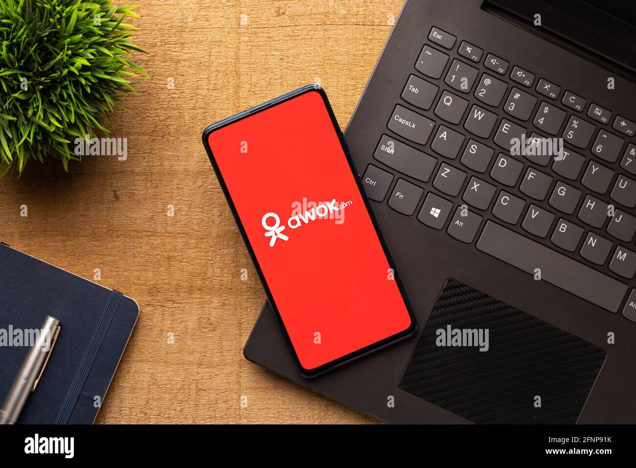 Assam, india - May 18, 2021 : Awok logo on phone screen stock image ...