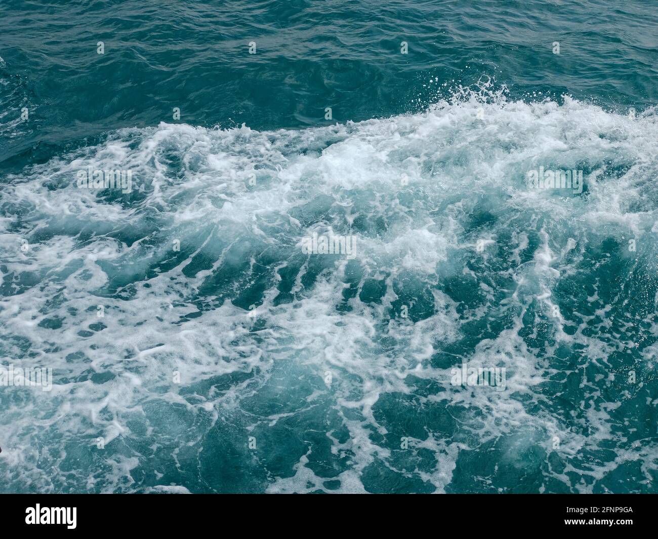 A close-up of the ocean wave surface wallpaper in the sunlight Stock ...