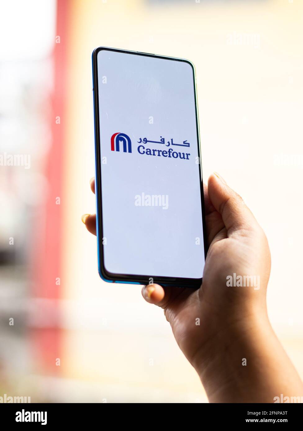 Assam, india - May 18, 2021 : Carrefour logo on phone screen stock ...