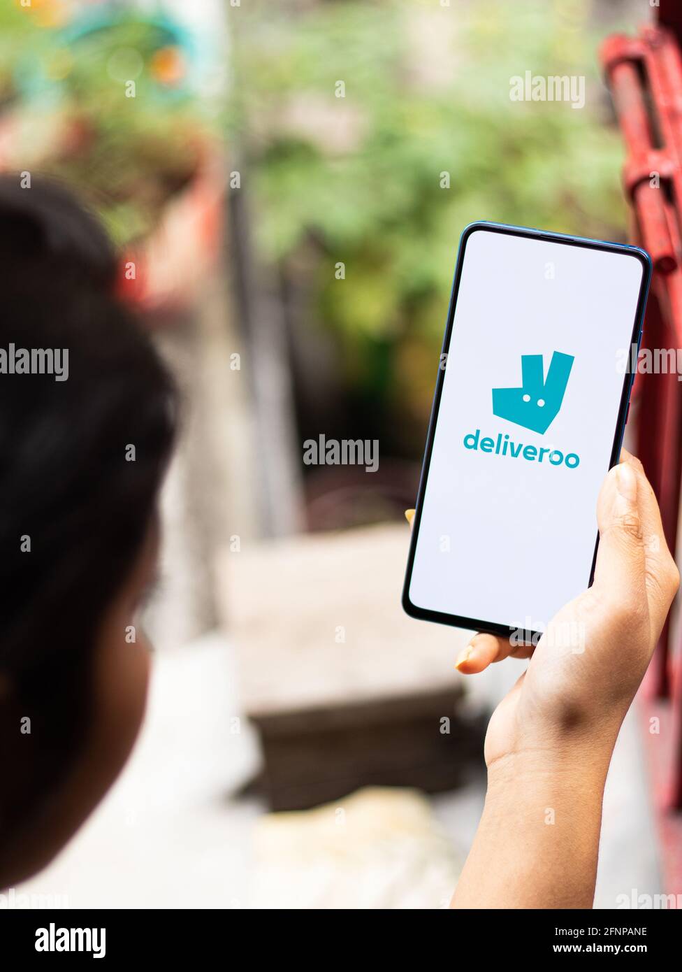 Assam, india - May 18, 2021 : Deliveroo logo on phone screen stock ...