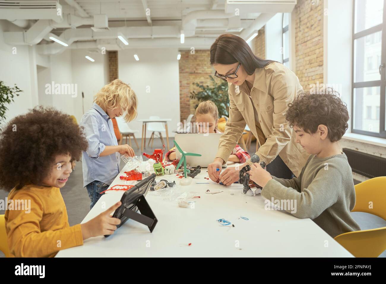 Enthusiastic teacher children hi-res stock photography and images - Alamy