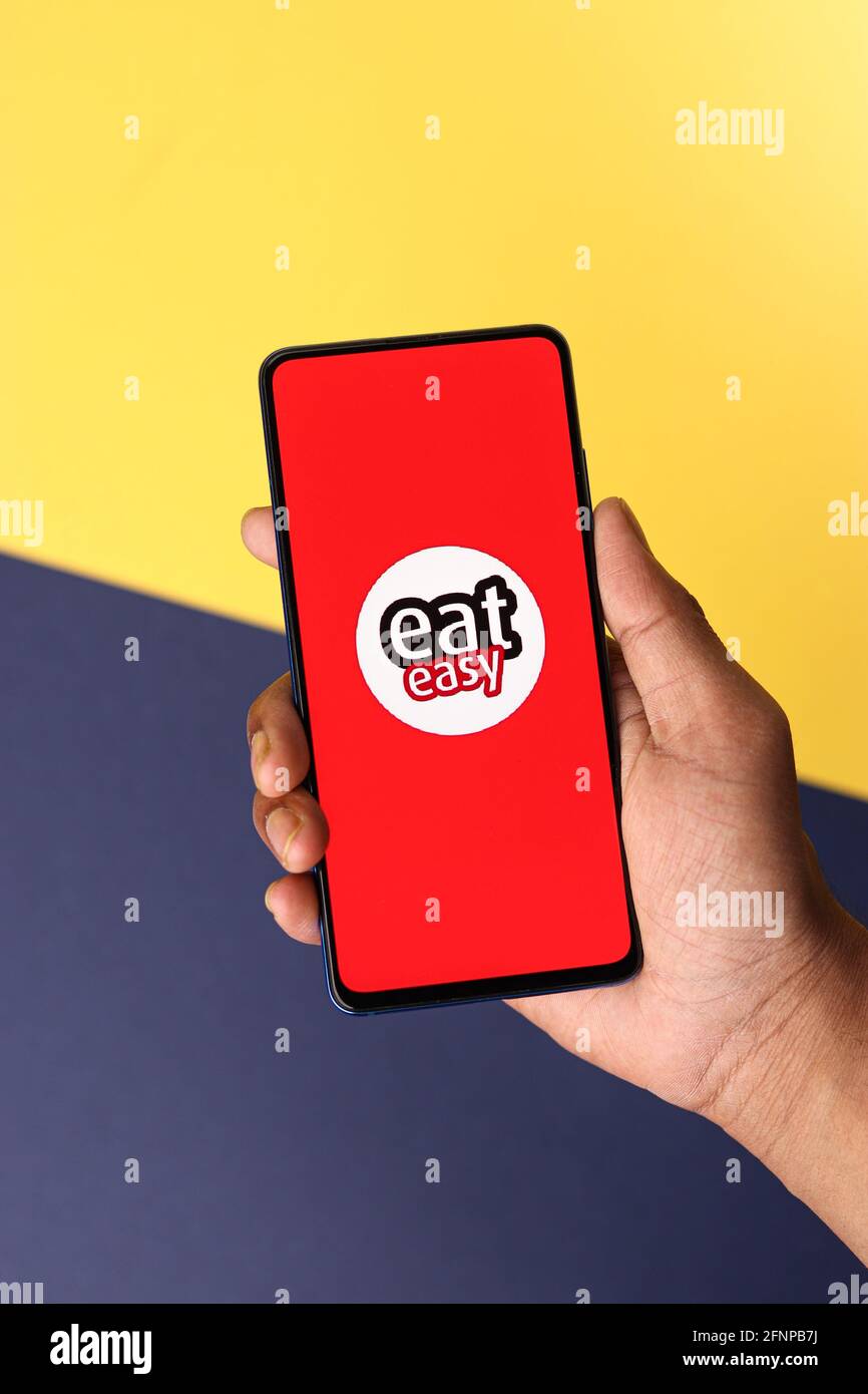 Assam, india - May 18, 2021 : Eat Easy logo on phone screen stock image ...