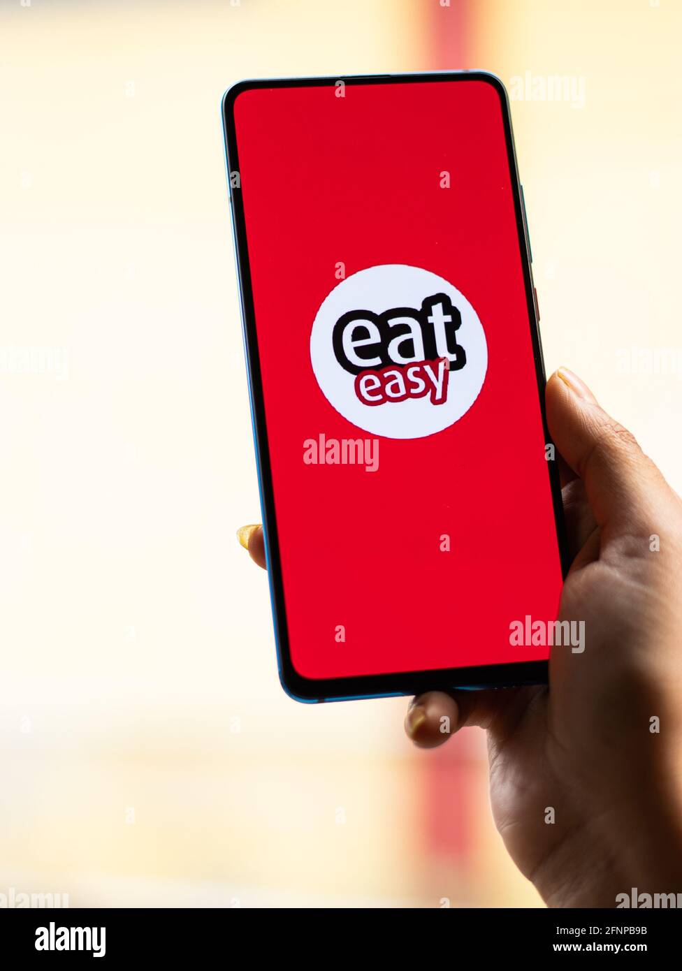 Assam, india - May 18, 2021 : Eat Easy logo on phone screen stock image ...