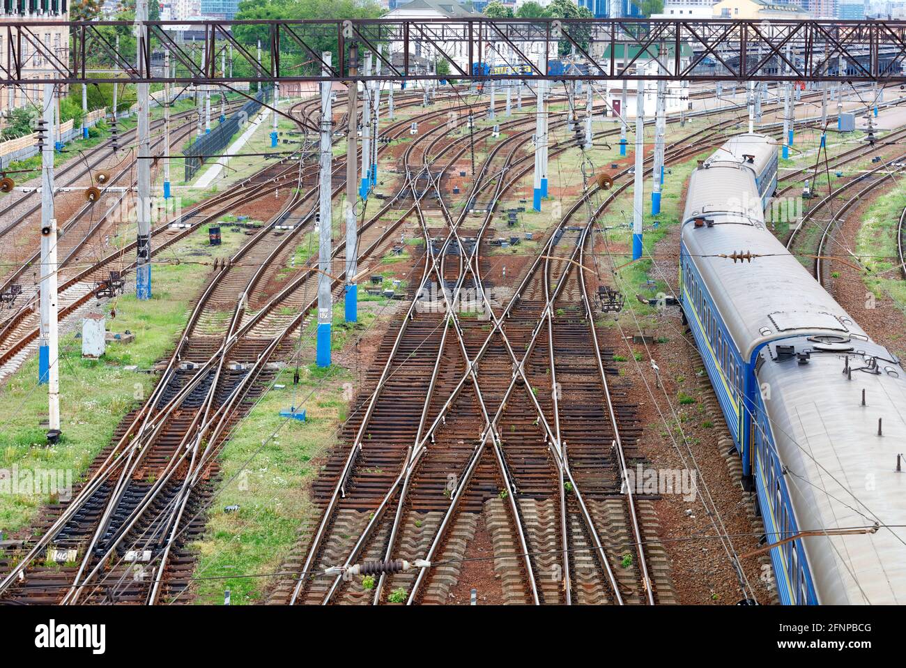 Extensive multichannel rail network for trains in the springtime, blue ...