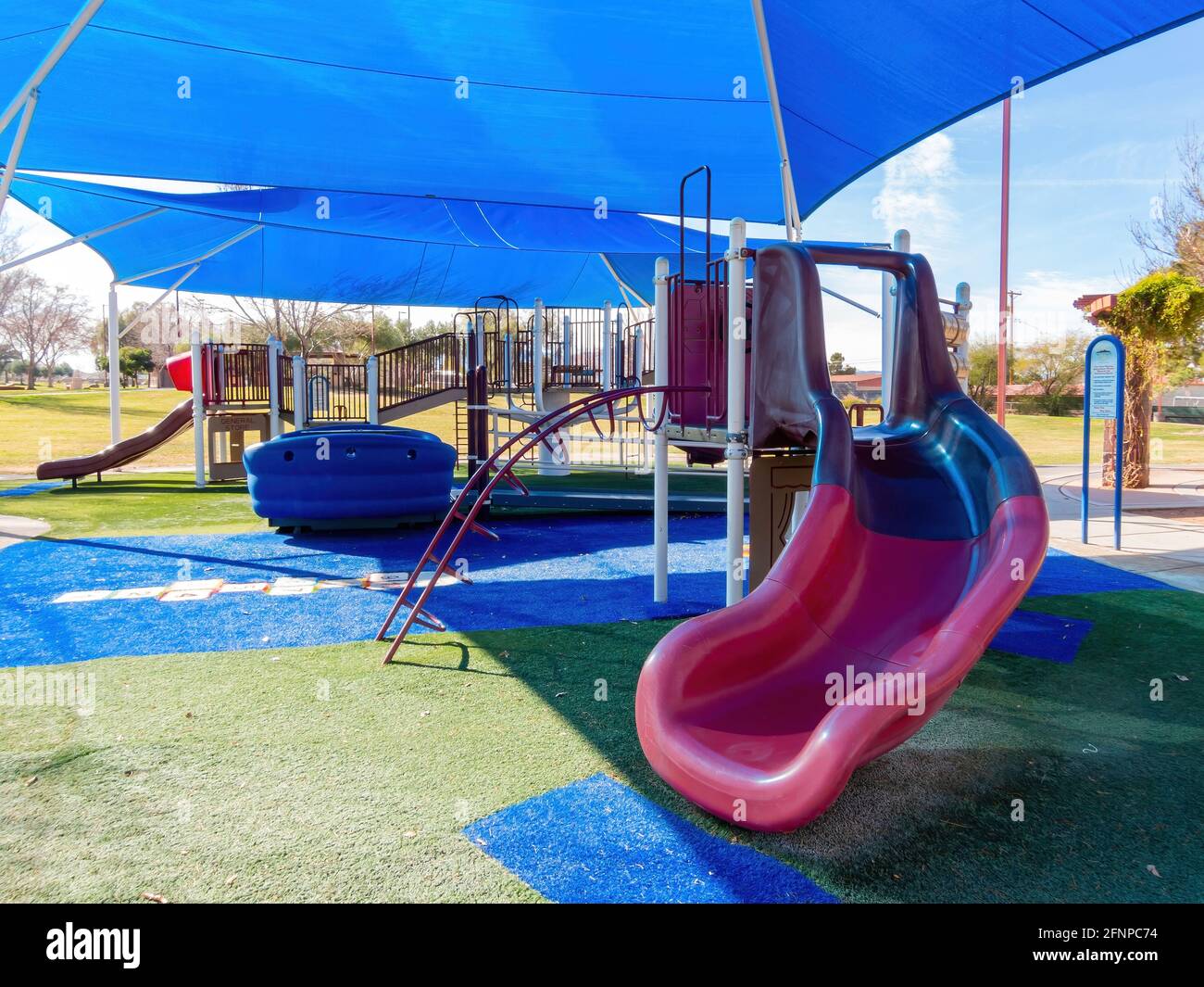 Sunny view of a children playground in Hayley Hendricks Park at ...