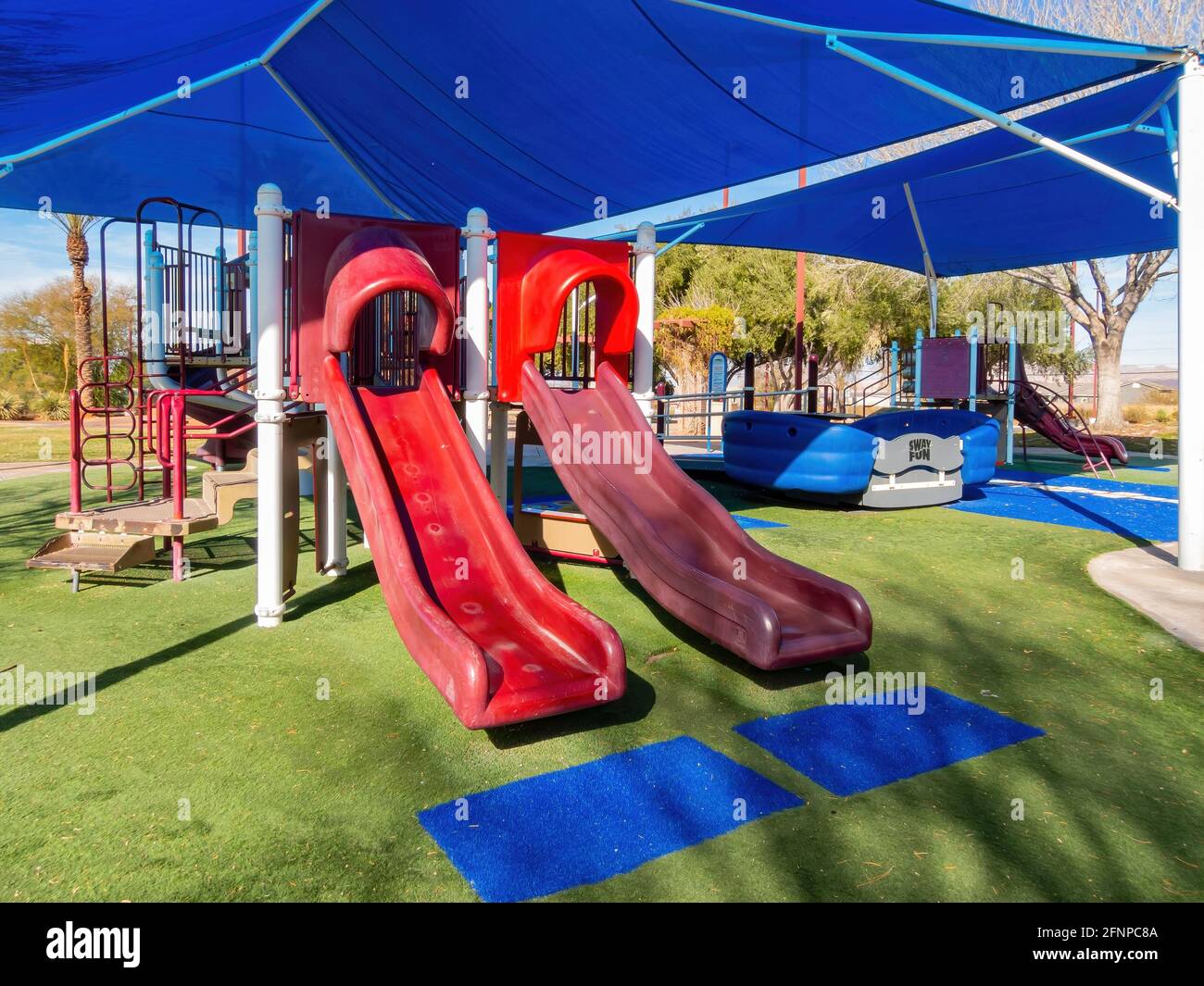 Sunny view of a children playground in Hayley Hendricks Park at ...