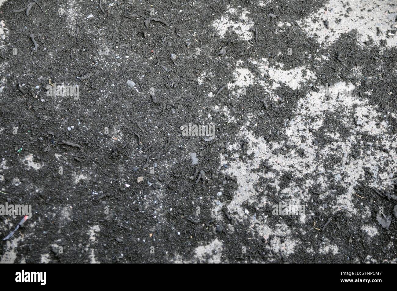 Remains of rubbed rubber on the asphalt of the race track. Drift ...