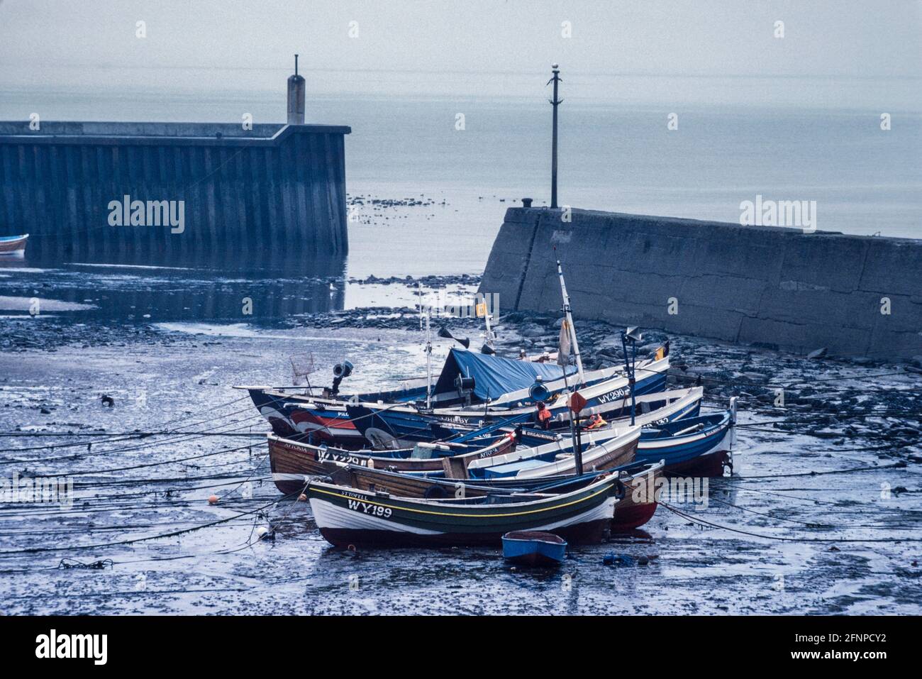 Staithes harbour with traditional cobble fishing boats Yorkshire 1979 ...