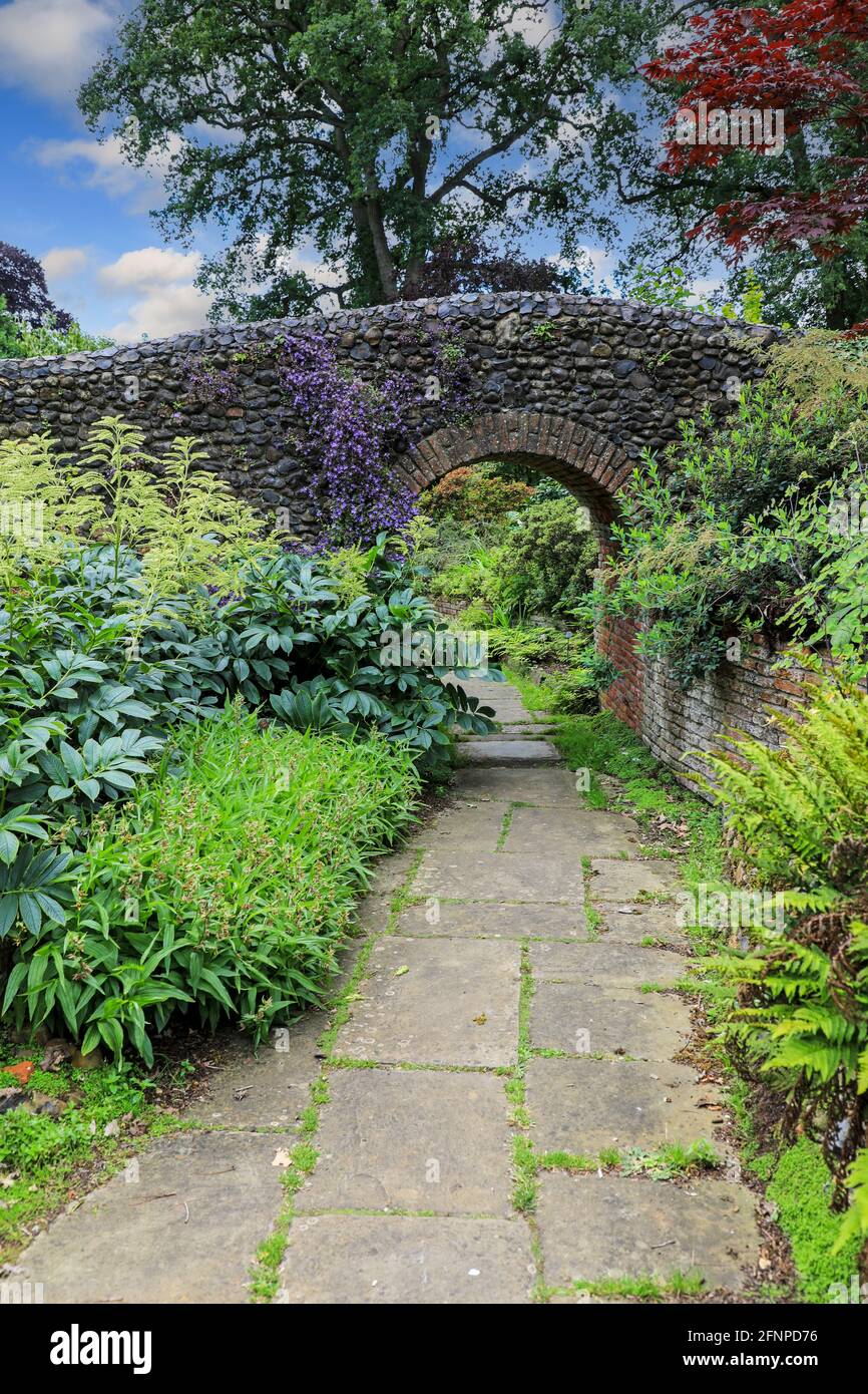 A flint Stone bridge in the grounds of Bressingham Gardens, a steam ...