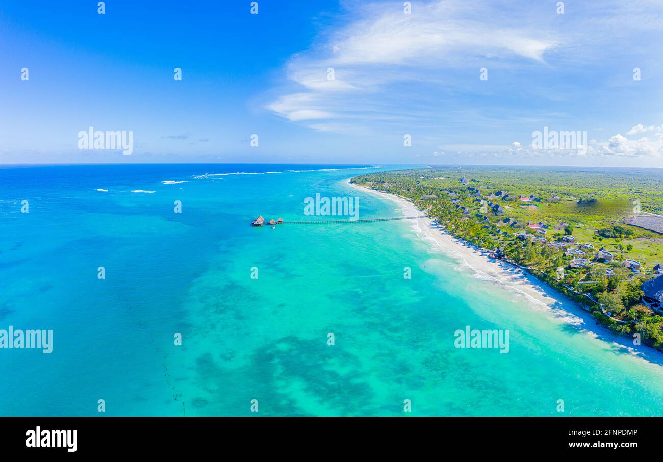 Aerial shot of the Stilt hut with palm thatch roof washed with ...