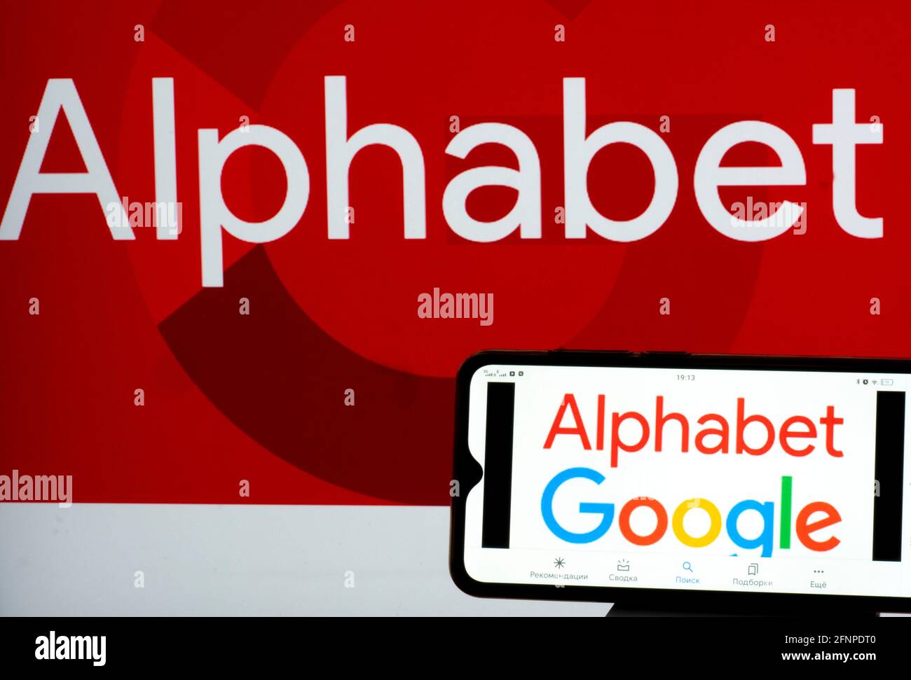 In this photo illustration Alphabet Inc. and Google logos seen ...