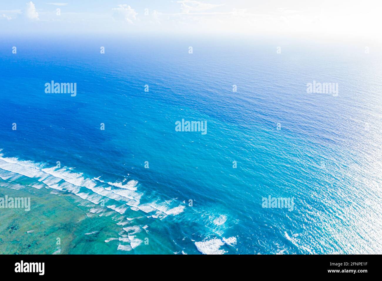 Aerial view to ocean waves. Blue water background. Dramatic colors ...