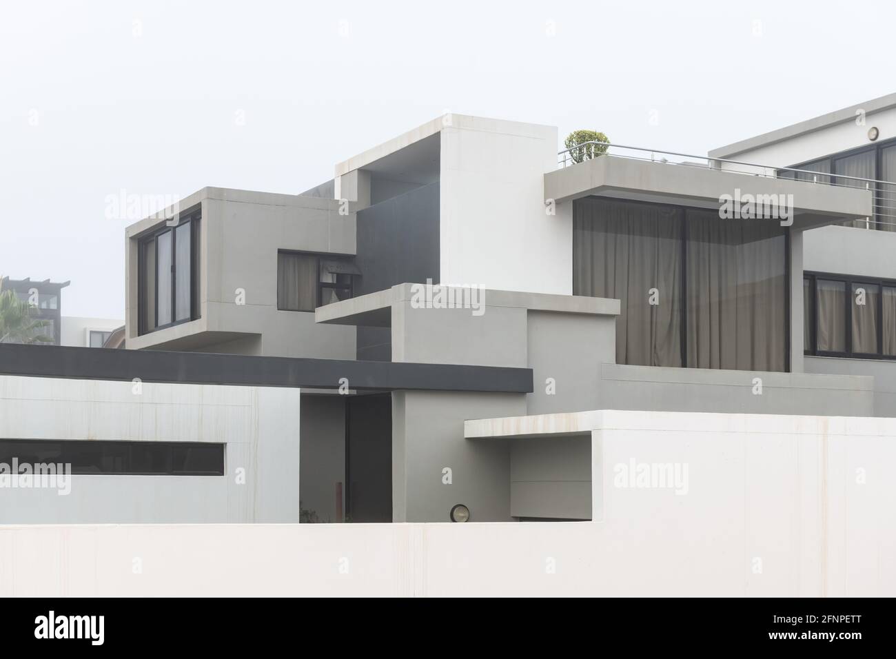 Exterior of a white and grey modern villa Stock Photo - Alamy