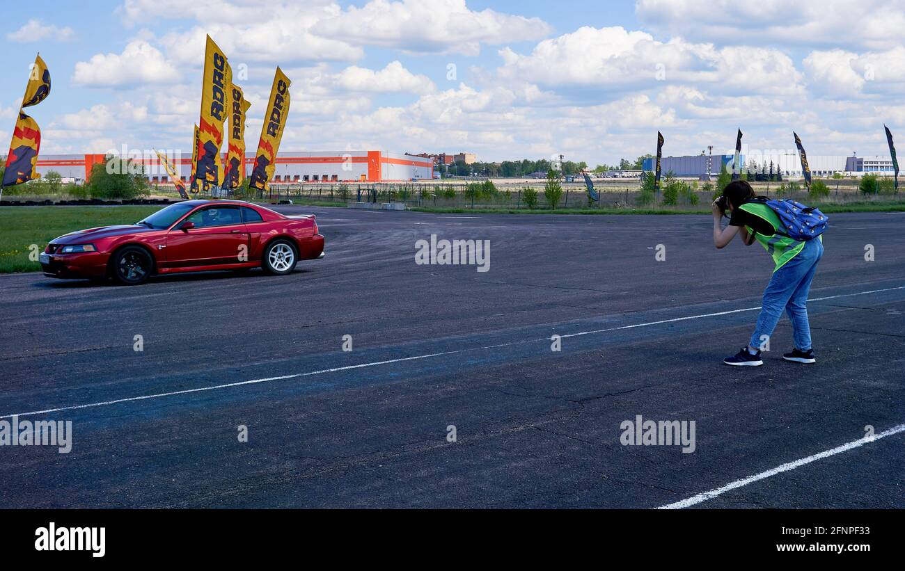 Moscow, Russia. 16th May, 2021. A photographer taking photographs of ...