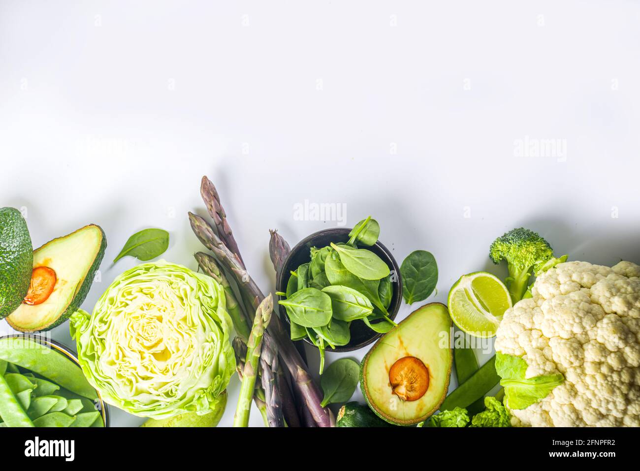 Healthy Diet Spring food background. Assortment of fresh raw organic ...