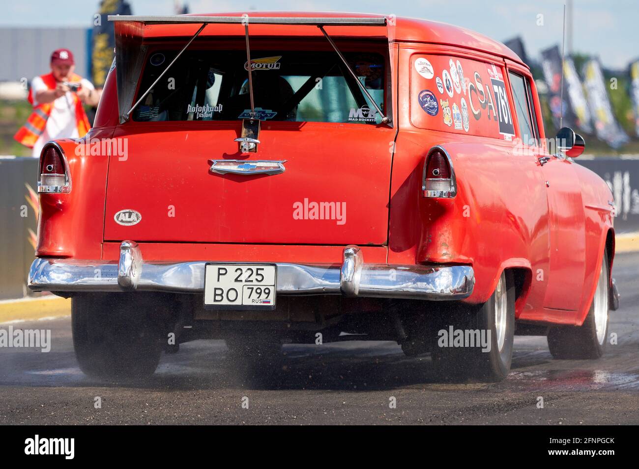 Red car from the 60s seen during the event. The annual classic drag ...